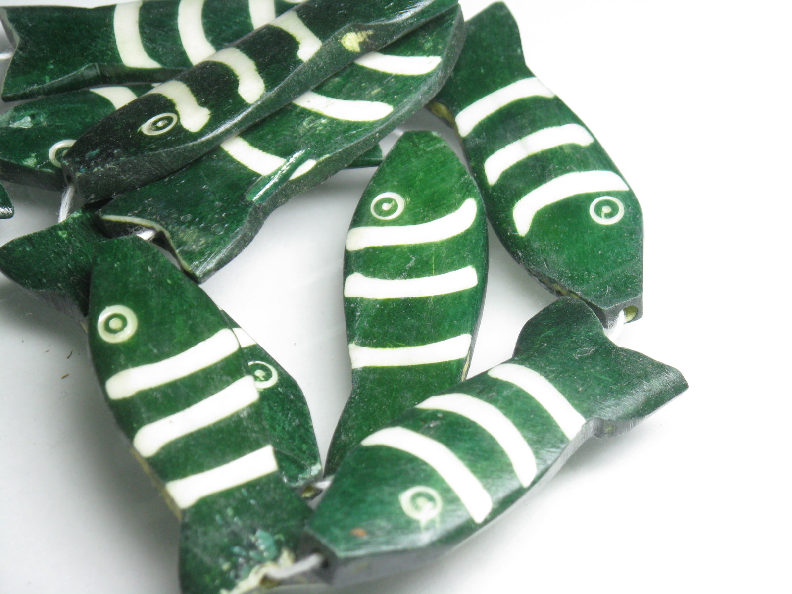 | TOKO-BEADS |AB200N-07 Bone bead (Fish) (strand) 13~17mm